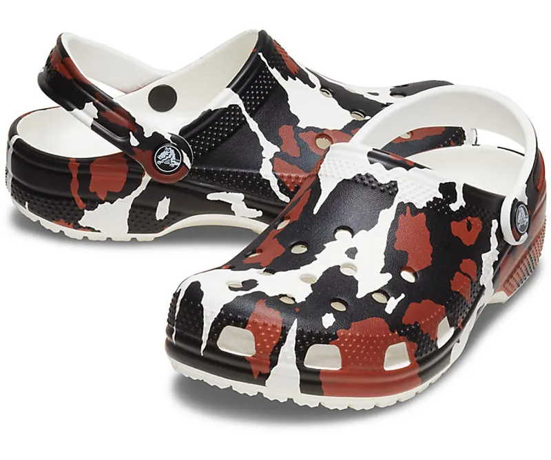 Crocs Classic Animal Print Clogs in Cow Print